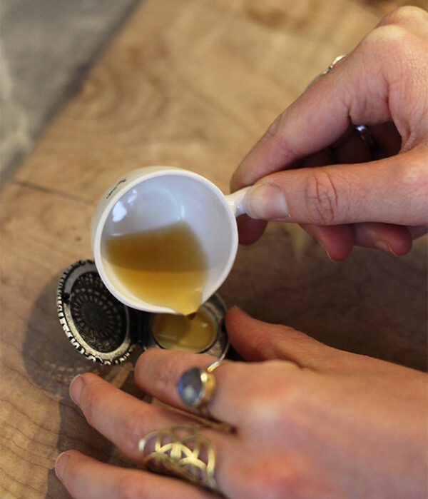 Step 5. POUR LIQUID PERFUME IN CONTAINER : Carefully pour the liquid ...